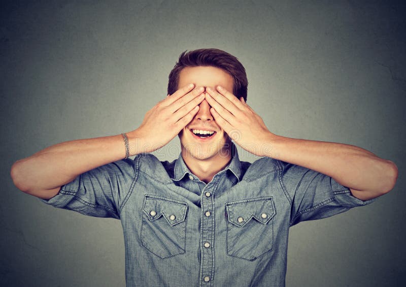Surprised Man Covering His Eyes Smiling Stock Photo - Image of facial ...