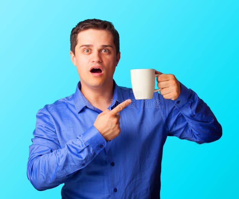 Surprised man with cup stock photo. Image of angry, headache - 44294688