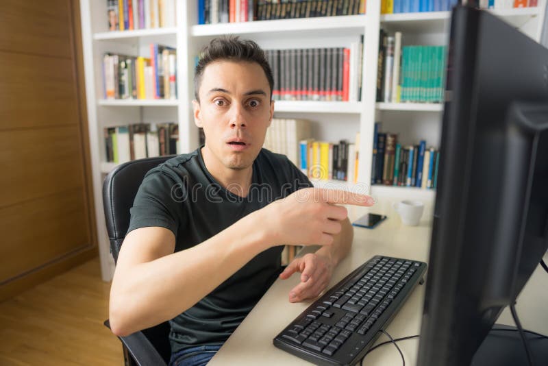 Surprised Man in Front of the Computer. Mid Shot Stock Photo - Image of ...