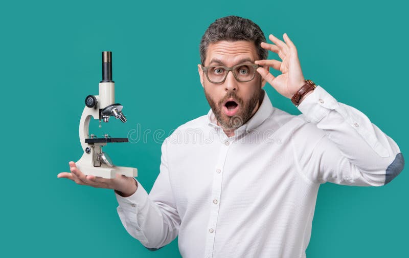 Surprised Man with Invention Microscope Isolated on Blue Background ...