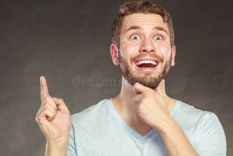 Surprised Man Pointing at Empty Blank Copy Space. Stock Image - Image ...
