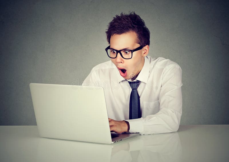 Surprised Man with Laptop Computer Stock Photo - Image of freelancer ...