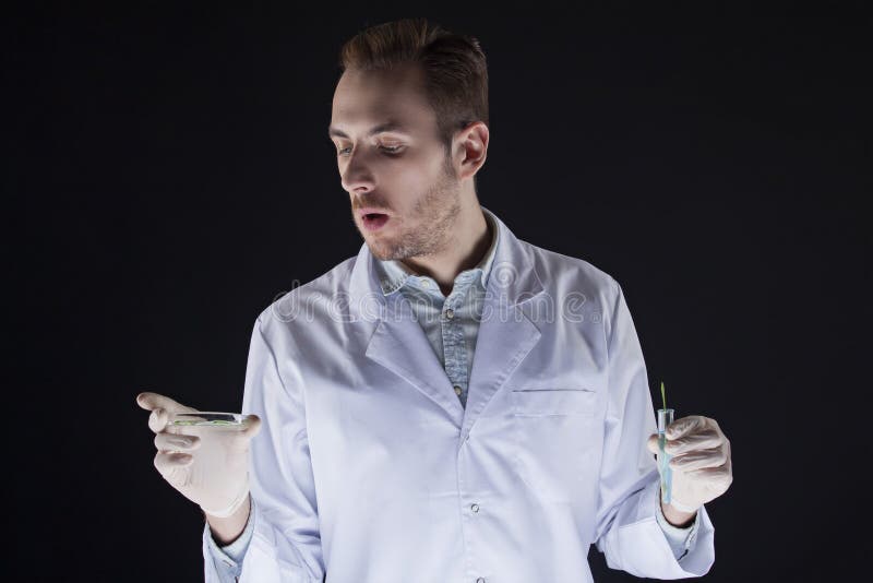 Surprised Scientist Looking into a Petri Dish Stock Photo - Image of ...