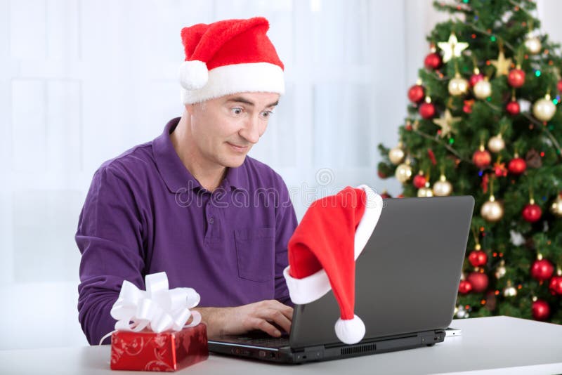 Surprised Senior Santa Claus Man Using Computer Stock Image - Image of ...