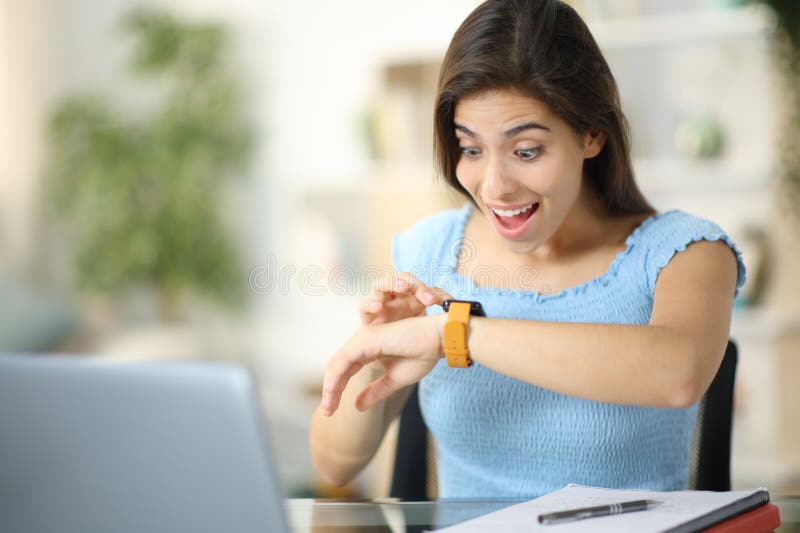 Surprised Student Checking Smartwatch at Home Stock Image - Image of ...