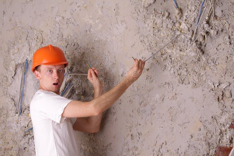 Surprised Worker Electric Trying and Cable Stock Image - Image of cable ...