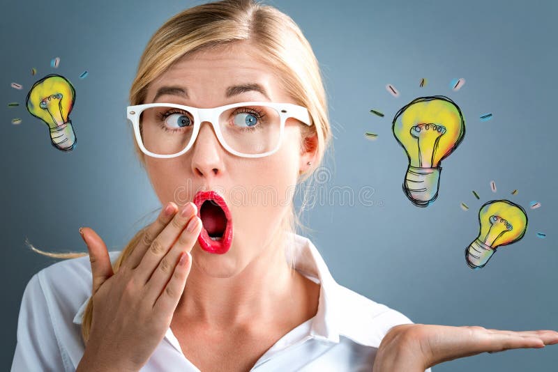 Surprised Young Business Woman with Light Bulbs Stock Image - Image of ...