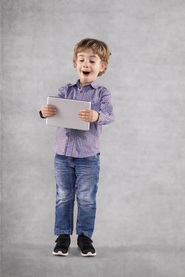 Surprised Young Businessman is Watching Something on the Tablet Stock ...