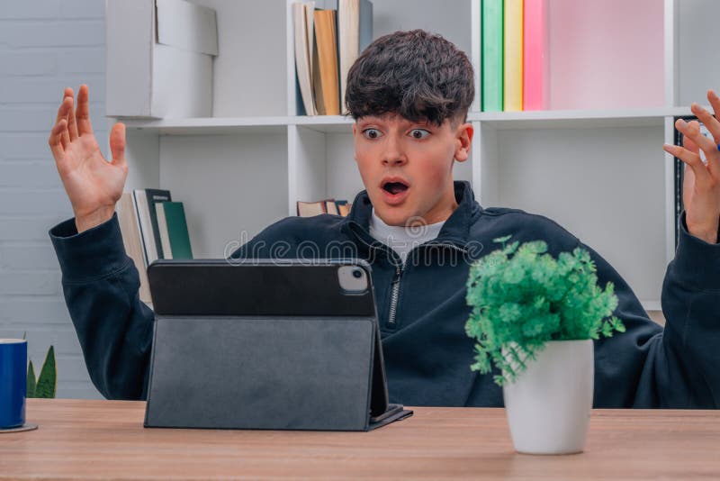 Surprised teenage student stock photo. Image of news - 239550302