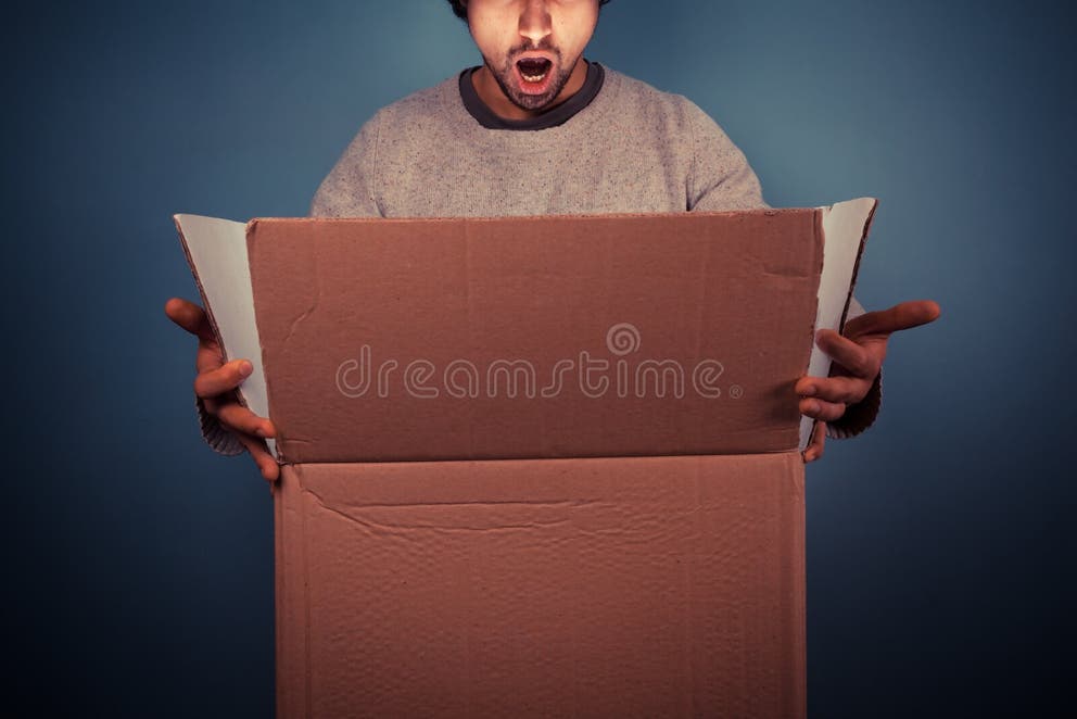 Surprised Young Man Opening Exciting Box Stock Image - Image of look ...