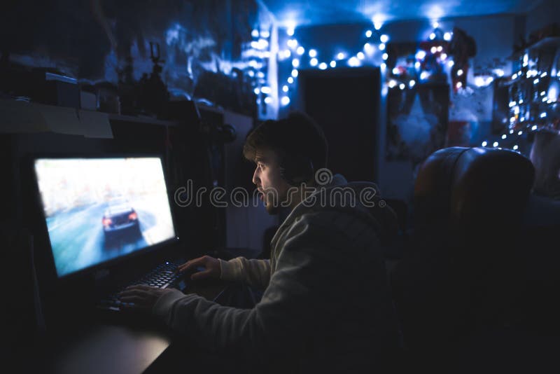 Surprised Young Man Playing Games on the Computer. a Man with a Beard ...