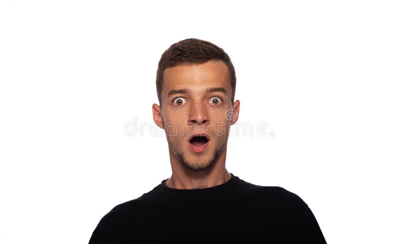 Surprised Young Man on a White Background. Stock Photo - Image of ...