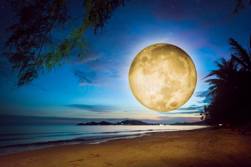 Surreal Full Moon Rise Over Seaside Stock Photo - Image of space ...