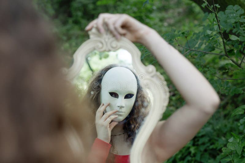 Surreal Reflection of a Woman with a Mask in a Mirror Stock Photo ...