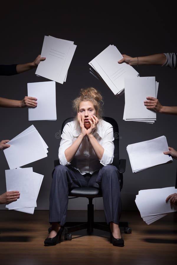 Surrounded by paperwork stock image. Image of multitasking - 102062033