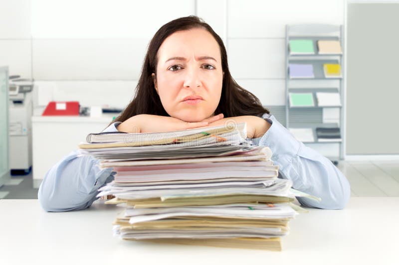 Surrounded by paperwork stock image. Image of multitasking - 102062033