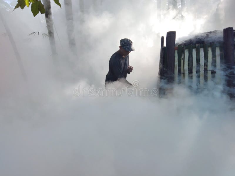 Surrounded by Thick Wood Smoke Editorial Stock Image - Image of making ...