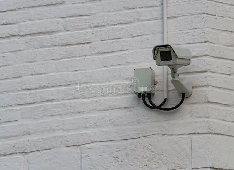 Surveillance Camera on a Brick Wall Stock Photo - Image of privacy ...