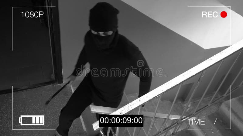 Surveillance Camera Caught the Robber in a Mask Running Off with a Bag ...