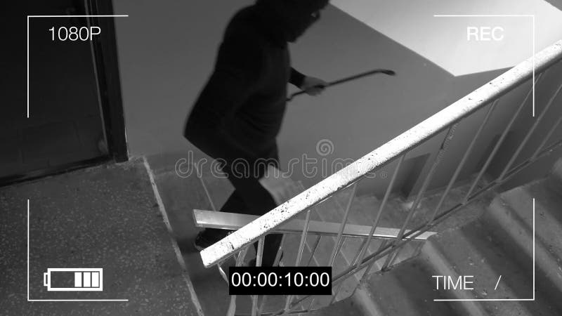 Surveillance Camera Caught the Robber in a Mask Running Off with a Bag ...