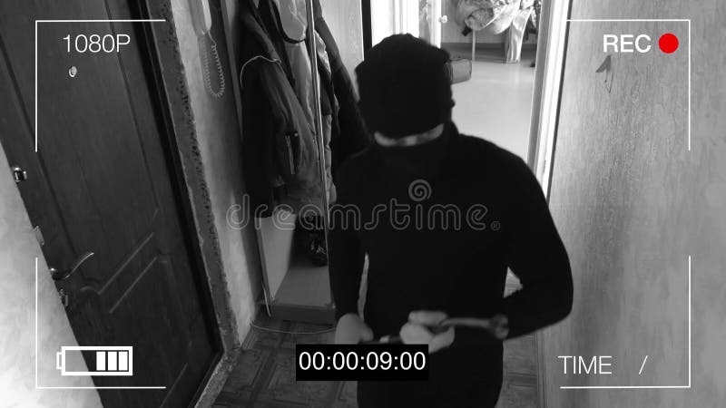 Surveillance Camera Caught the Robber in a Mask Running Off with a Bag ...