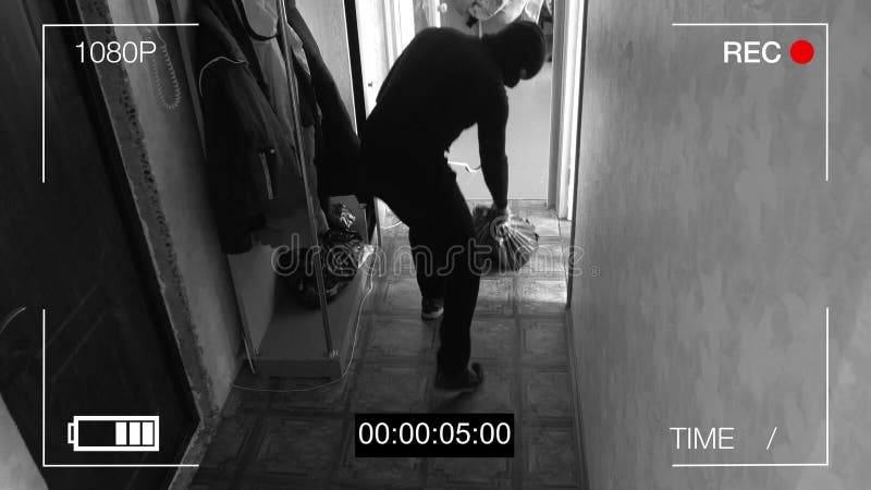 Surveillance Camera Caught the Robber in a Mask Running Off with a Bag ...