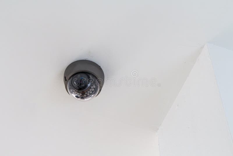 A Surveillance Camera on Ceiling Stock Image - Image of black, safety ...
