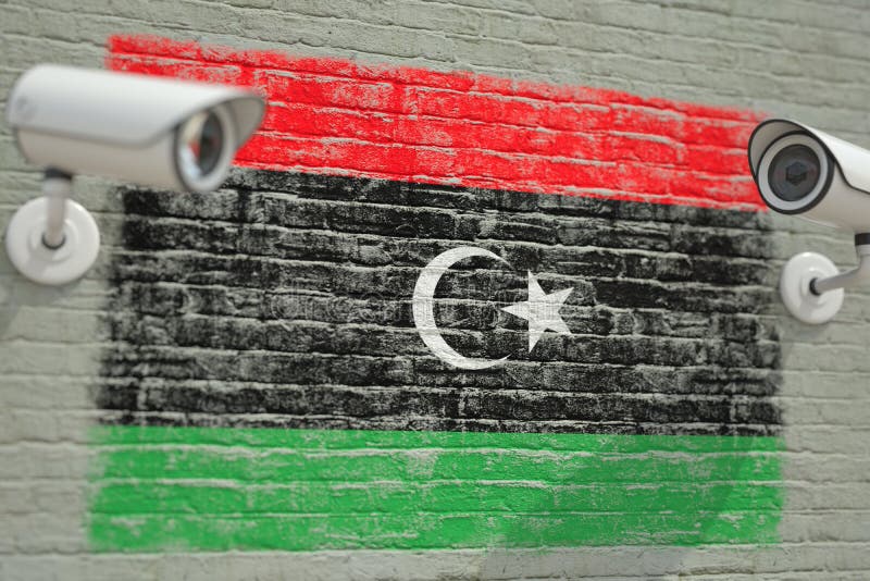 Wall with National Flag of Libya and CCTV Cameras. Privacy or ...