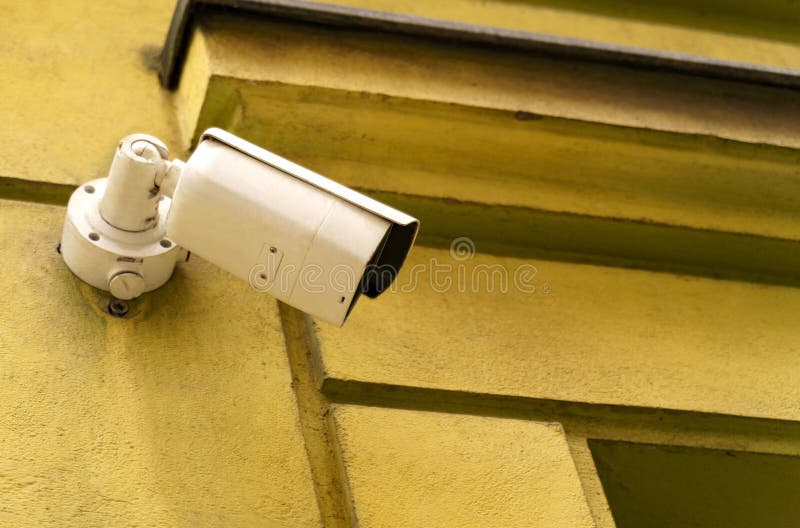 Surveillance Camera Installed on the Wall of an Old Building. Stock ...