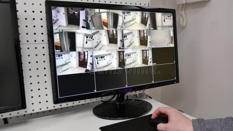 A Surveillance Camera Positioned Against a Brilliant Clear Blue Sky ...