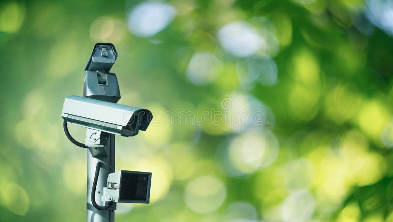 Surveillance Camera with Motion Sensor on a Green Background Stock ...