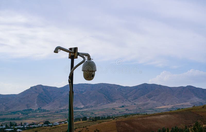 Surveillance Camera on the Mountain Stock Photo - Image of white ...