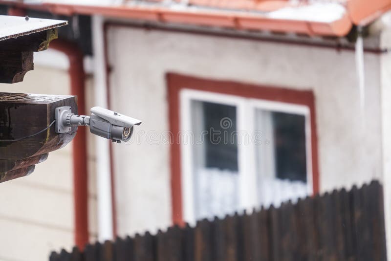 Surveillance Camera Mounted on the Corner of a House. Stock Photo ...
