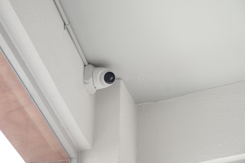 A Surveillance Camera is Professionally Mounted in a Sleek Modern ...
