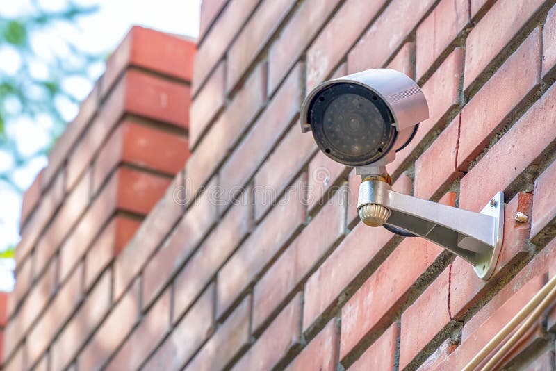 Surveillance Camera on Red Brick Wall Stock Image - Image of ...