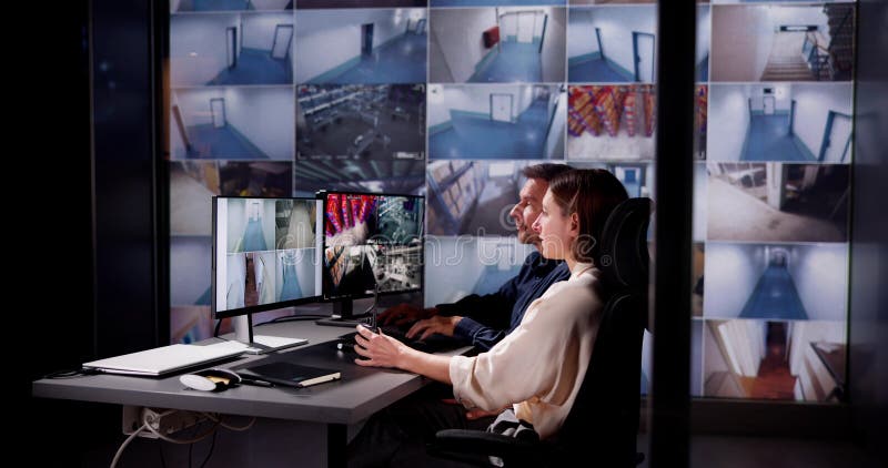 Man in Control Room Monitoring Cctv Footage Stock Photo - Image of cctv ...