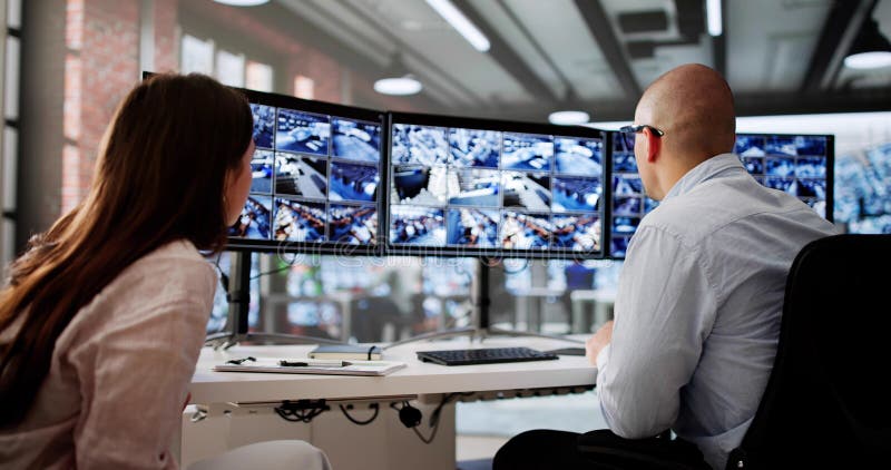 Surveillance Operator Monitors Multiple CCTV Cameras Stock Photo ...