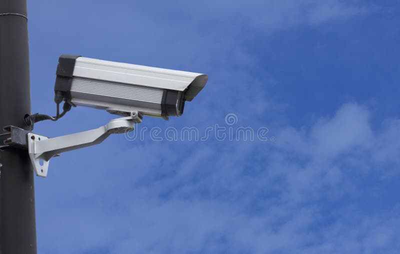 Surveillance Security Camera or CCTV on Blue Sky Stock Photo - Image of ...
