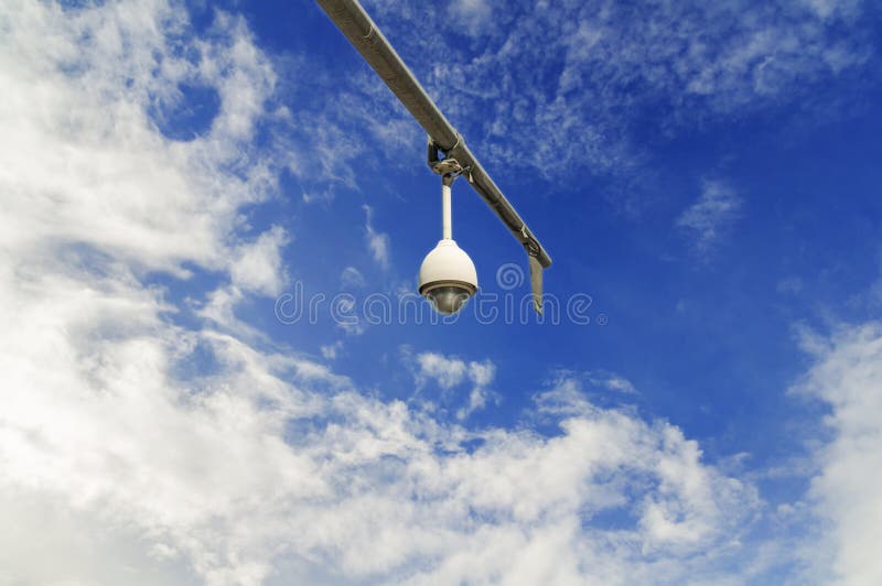 Surveillance Security Camera or CCTV on Blue Sky Stock Photo - Image of ...