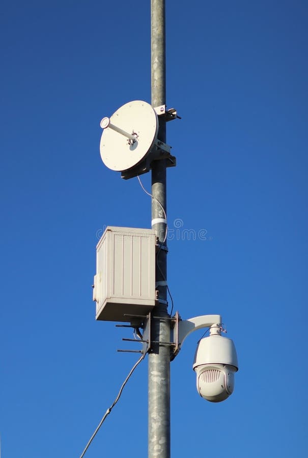 Surveillance System with an Orange Warning Light Located on a Pole in ...
