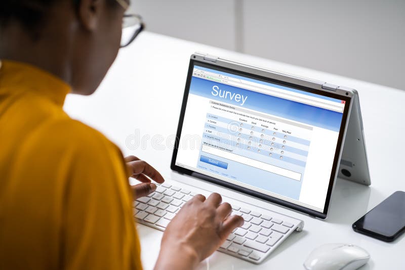 Survey on Laptop Screen stock photo. Image of businesswoman - 211507278