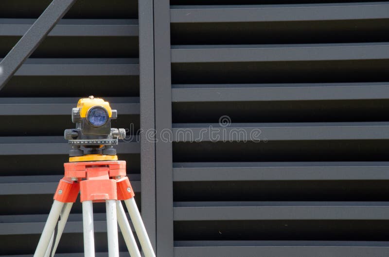 Surveying Measuring Equipment Level Transit on Tripod at Construction ...