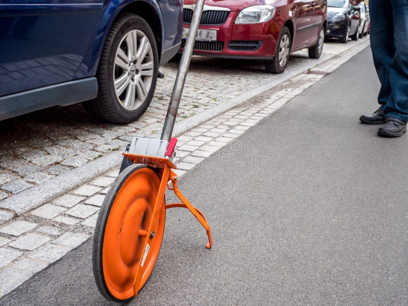 Surveying Wheel in Road Construction Stock Photo - Image of full ...