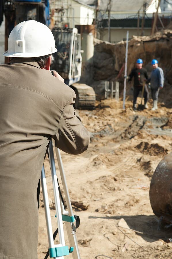 Surveyor at Construction Work Stock Photo - Image of land, builder ...
