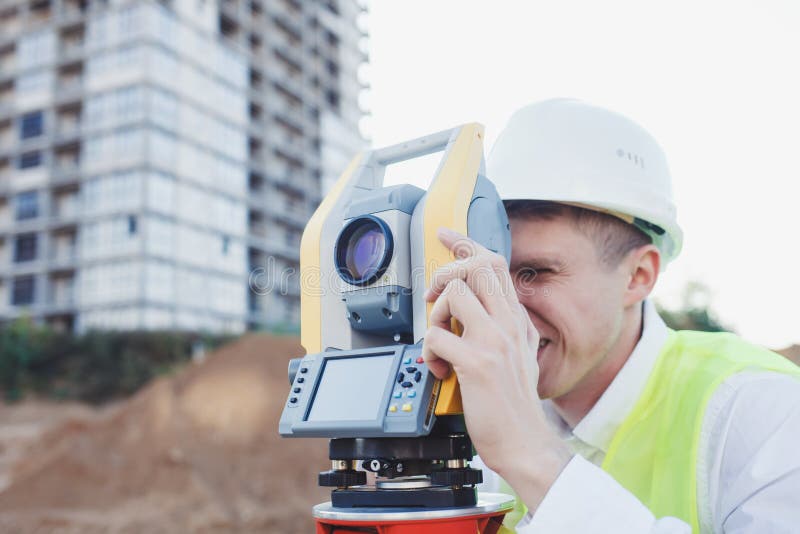 Surveyor Engineer in Helmet Stock Image - Image of measurement, station ...