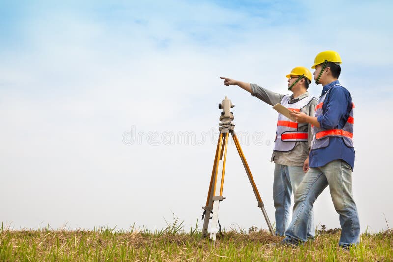 Surveyor Engineer Making Measure With Partner Stock Image - Image of ... Surveyor Engineer Making Measure With Partner Stock Image - Image of ...