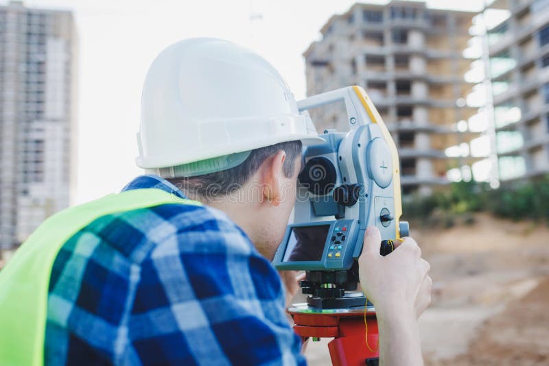 Surveyor Engineer is Measuring Level Stock Photo - Image of control ...