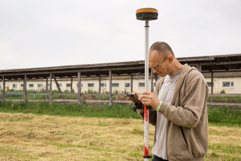 A Surveyor with a GNSS Receiver Stock Image - Image of engineering ...