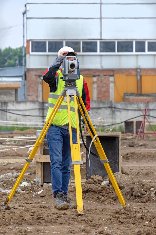The Surveyor Performs Topographic Survey of the Area for the Cadastre ...