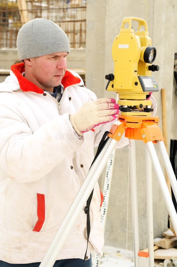 Surveyor Worker at Construction Stock Photo - Image of geodesy, angles ...